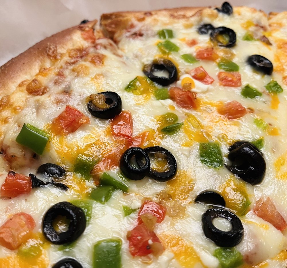 Pizzaholic Reviews | Calgary, AB | One Bite